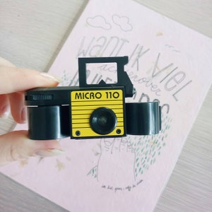 Micro 110 camera with coinbox & keychain