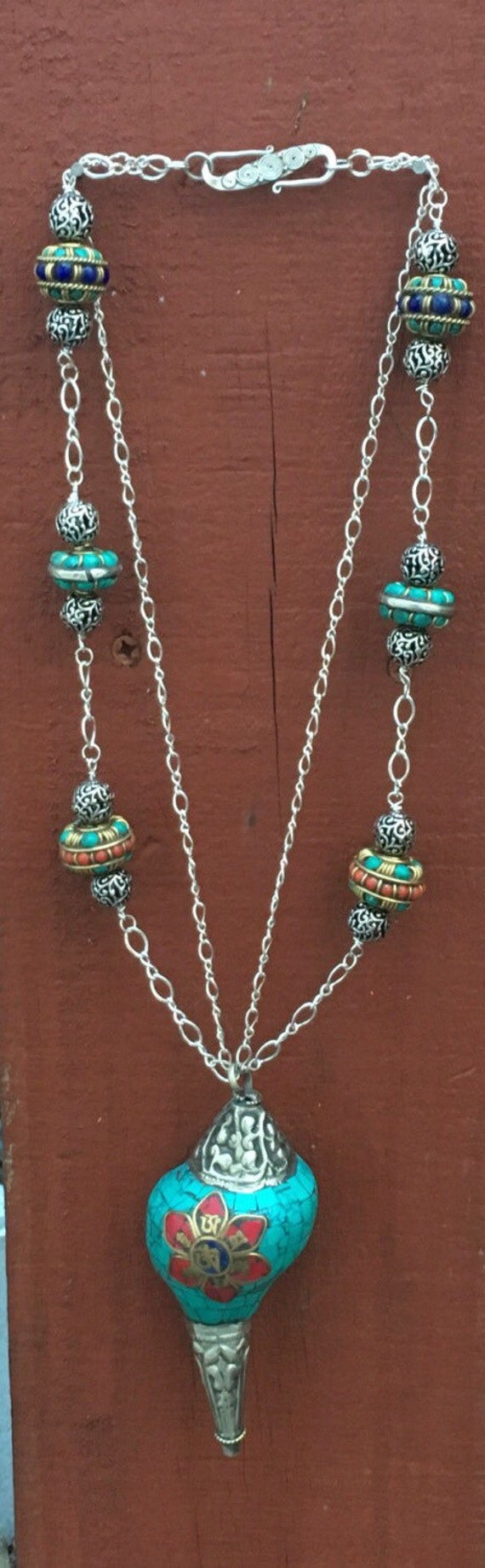 Conch shell necklace by HouseCollectibles on Etsy