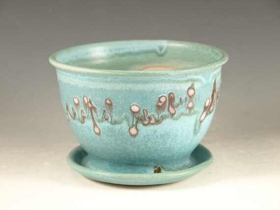 Pottery planter in turquoise glaze flower herb plant