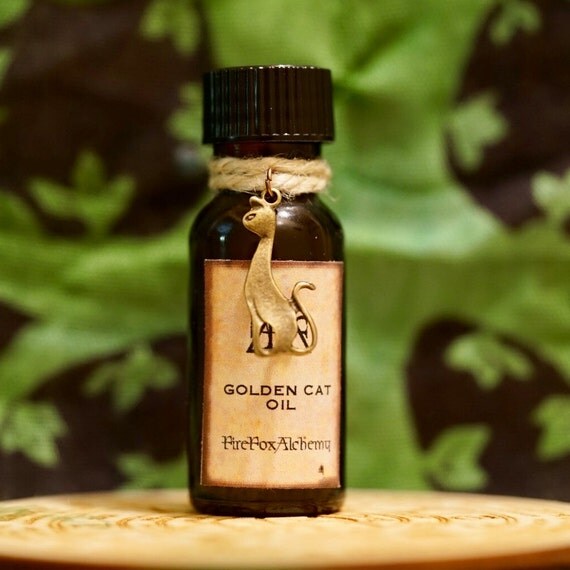 Golden Cat Oil: Ritual Oil for Abundance Success Endurance