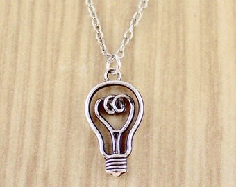 Light bulb necklace | Etsy