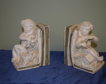 Cherub bookends | Etsy