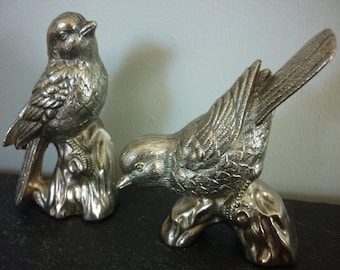 Metal bird figurine | Etsy