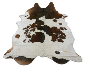 White cowhide rug | Etsy