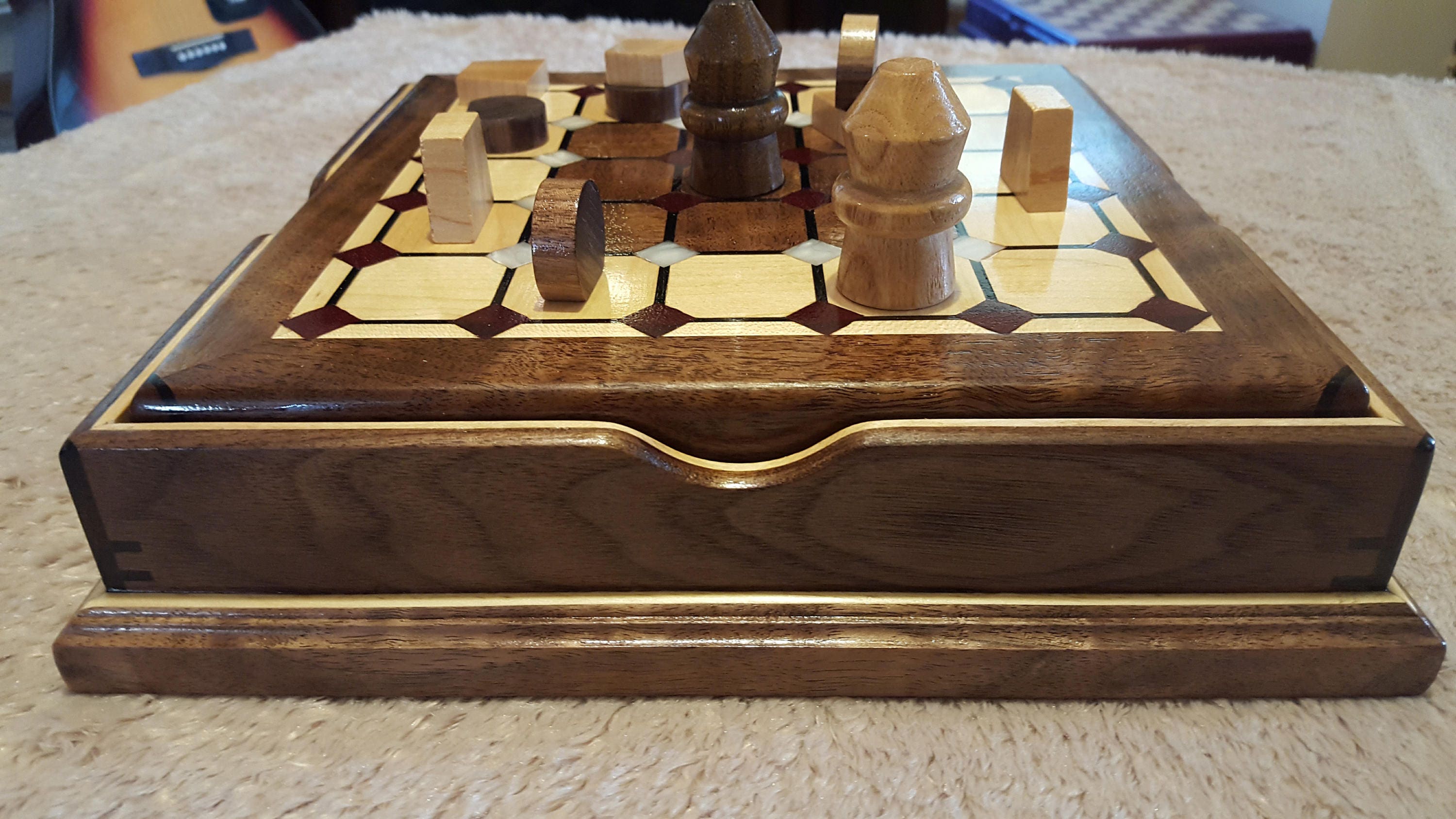 Tak board with box and game pieces