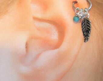 Tribal feather cartilage earring piercing gold feather