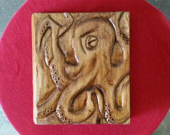 Carved octopus | Etsy