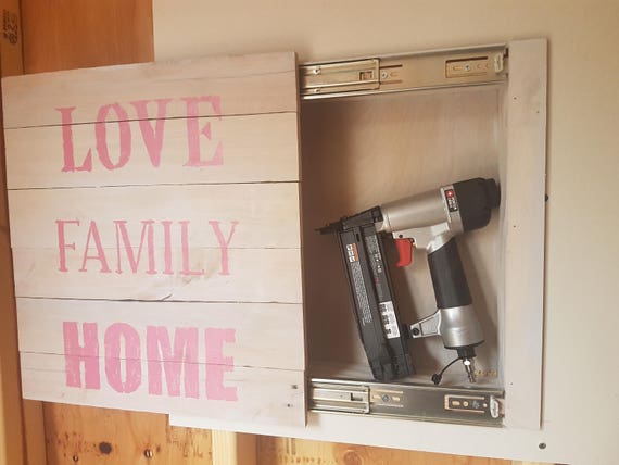 Concealed firearm hidden gun storage wall decor