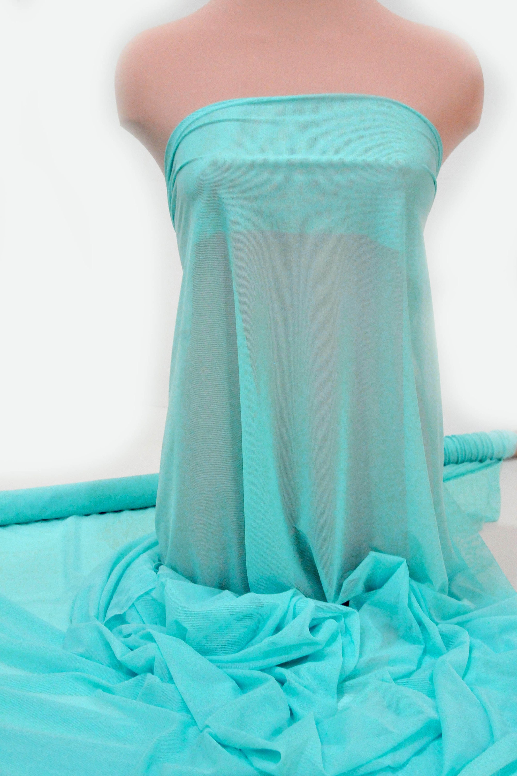 Power mesh stretch fabric semi sheer 4 ways stretch.. Aqua