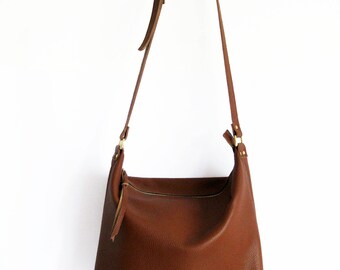 High quality handbags leather totes and accessories. by KadoBag