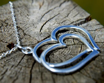 Two hearts necklace | Etsy