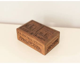 wooden historical box with hand carved lid