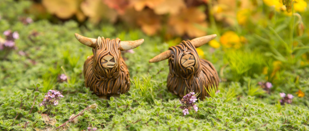Small pottery highland cow