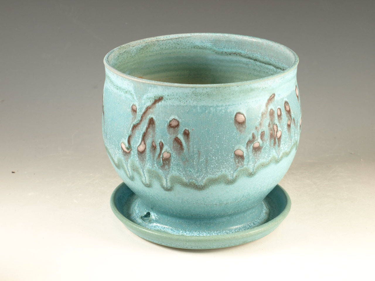 Pottery planter in turquoise glaze flower herb plant