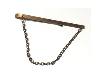 Vintage brass jet plane tie bar / tie clip. Aviation collector