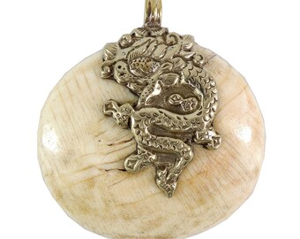 Pema Tibetan silver repousse covered chank shell pendant