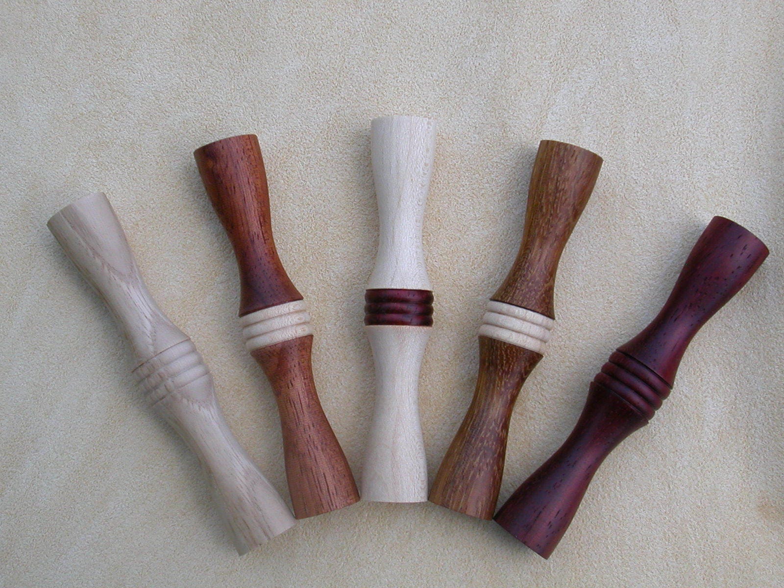 Pipe tampers Albatros model handturned in various woods.