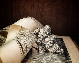 Justin Rowe paper sculptures and book art. by daysfalllikeleaves