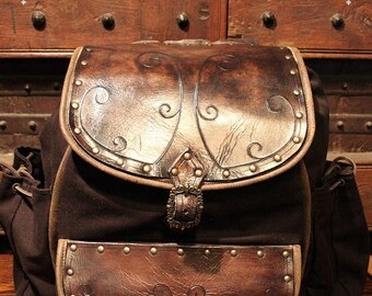 Medieval jewelry steampunk clothing and LARP leather by Dracolite