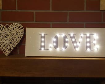 Letters of metal LARGE EAT sign light up kitchen or restaurant