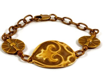 Embossed bracelet | Etsy