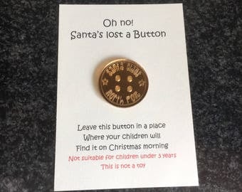 Santas lost button | Etsy