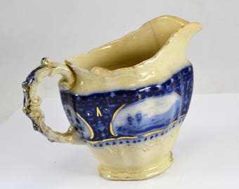 Flow blue pitcher | Etsy