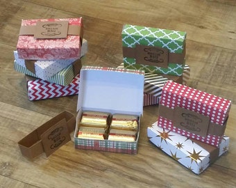 Cute handmade paper gift boxes with a ribbon different