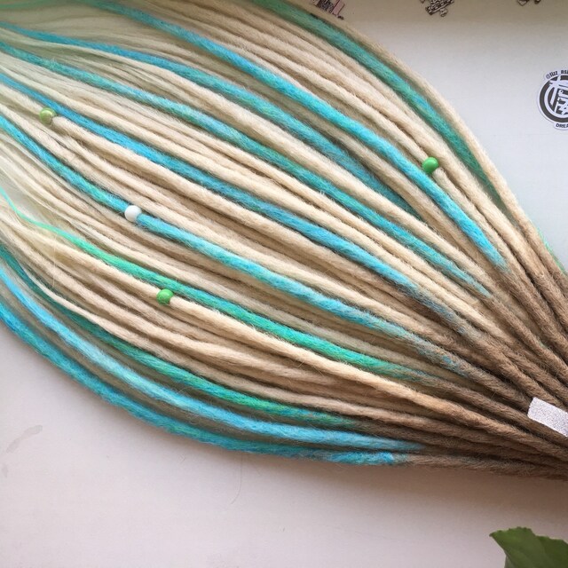 Custom Synthetic Dreads and Dread Accessories by fizzdreads