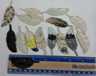 Ceramic feather | Etsy