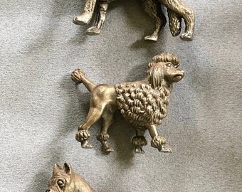 Metal dog figurine | Etsy