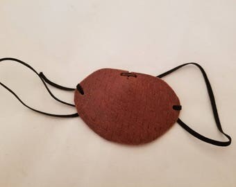 Leather eye patch with adjustable buckle will work for