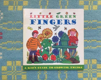 OH SUCCULENT a bright green plant in a blue pot against a