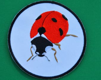 Hand embroidered Ladybug bib