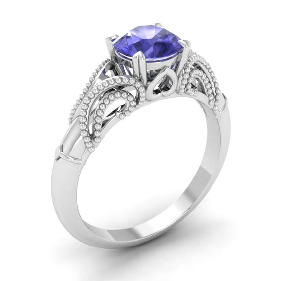 Simple solitaire round tanzanite crown setting engagement ring - genieras