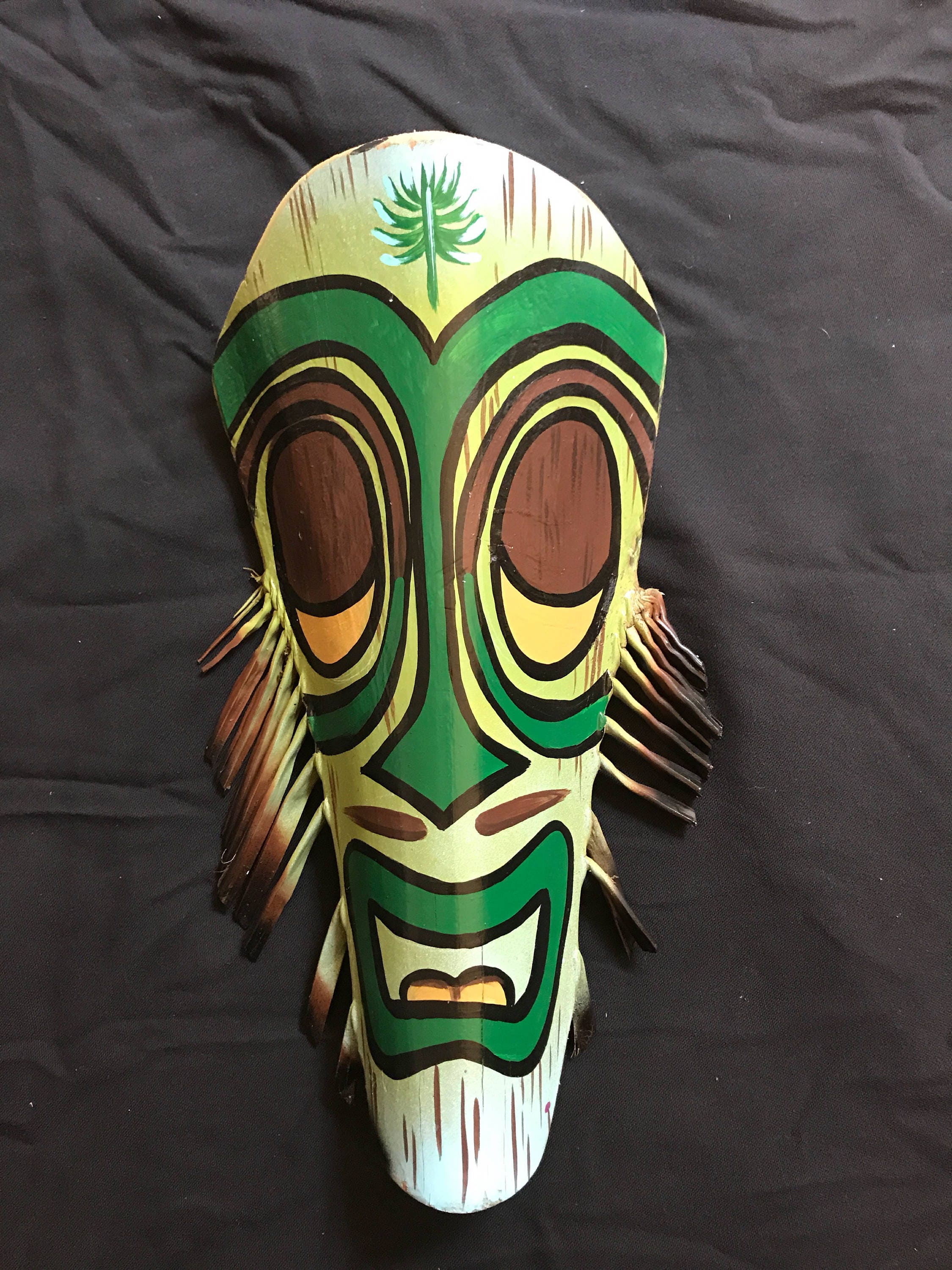 Green Tiki Mask made of palm frond