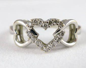 Interlocking hearts | Etsy