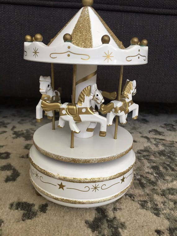 Items similar to White and Gold Carousel on Etsy