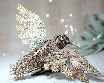 Metal bird figurine | Etsy