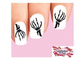 Skeleton hand decal | Etsy