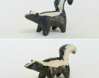 Ceramic skunk | Etsy