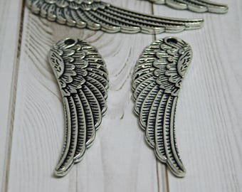 Angel wing pendant | Etsy
