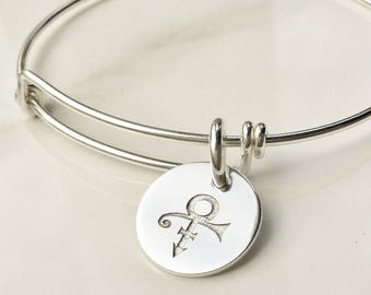 Prince symbol | Etsy